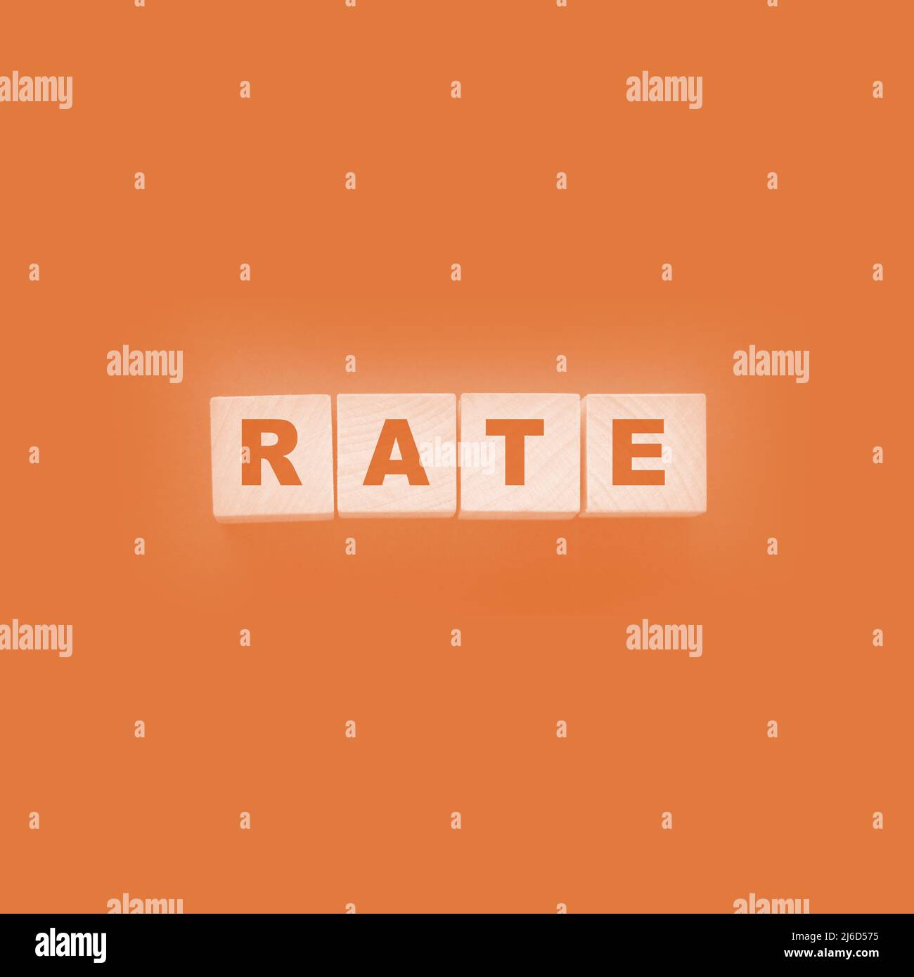 Rate word concept written on wooden cubes blocks lying on a black ...