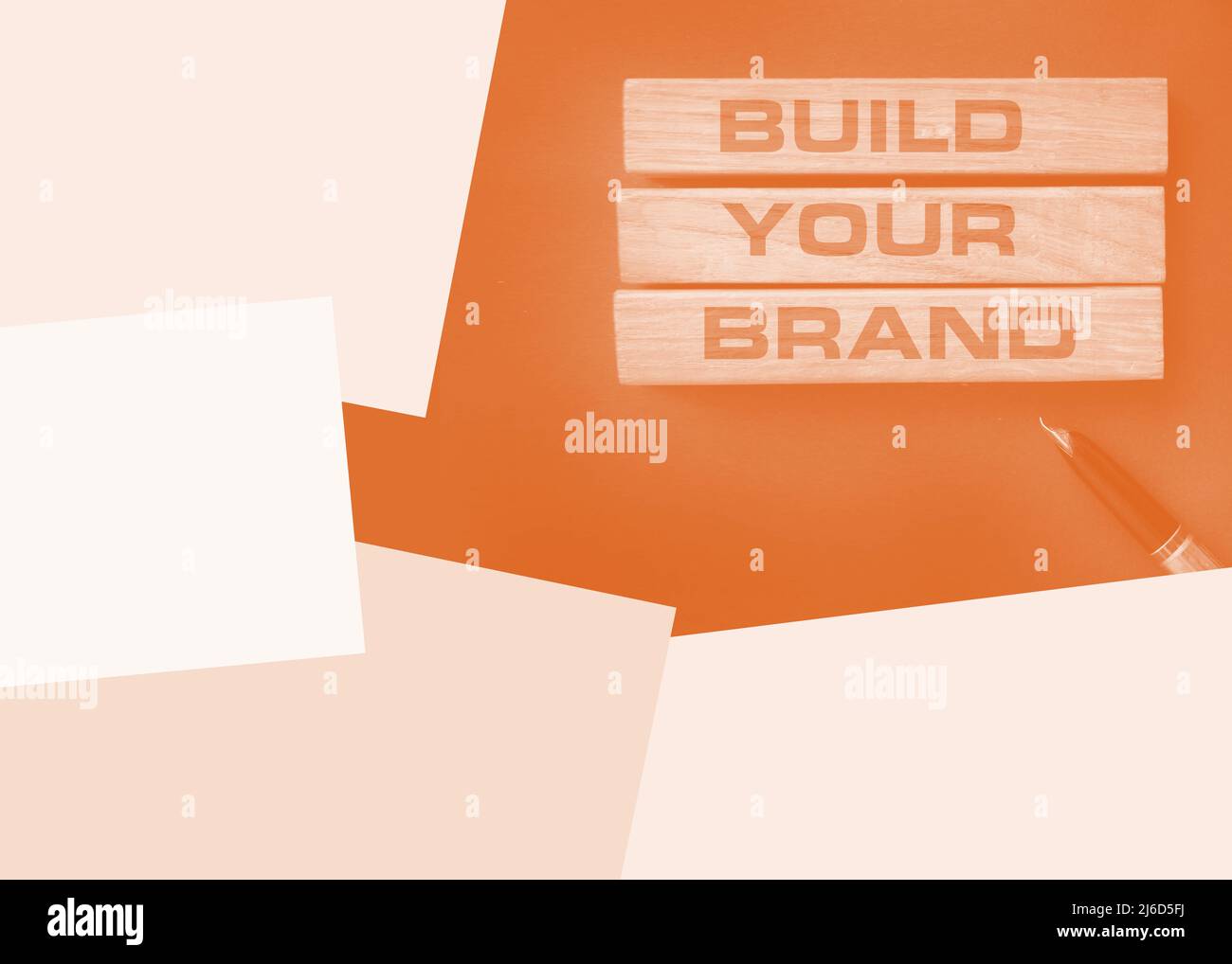 Build your Brand written on wooden blocks with vintage styled ...