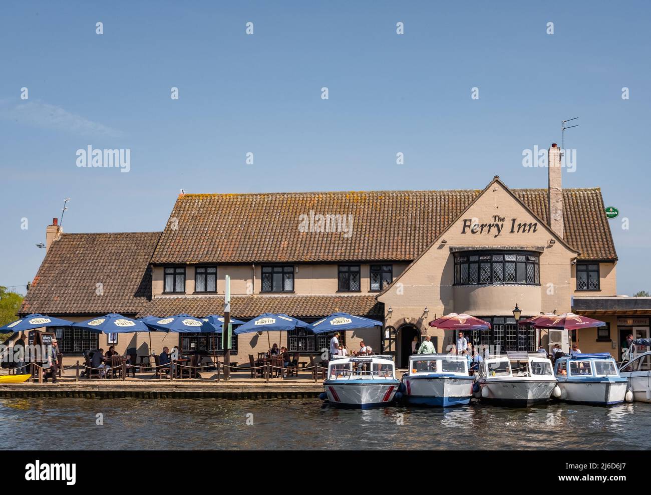 The Ferry Inn public house on the bank of the River Bure in Horning ...