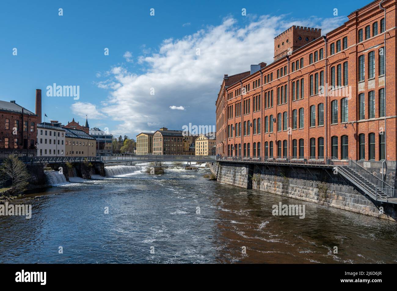 The historic industrial landscape and Motala river in Norrköping ...
