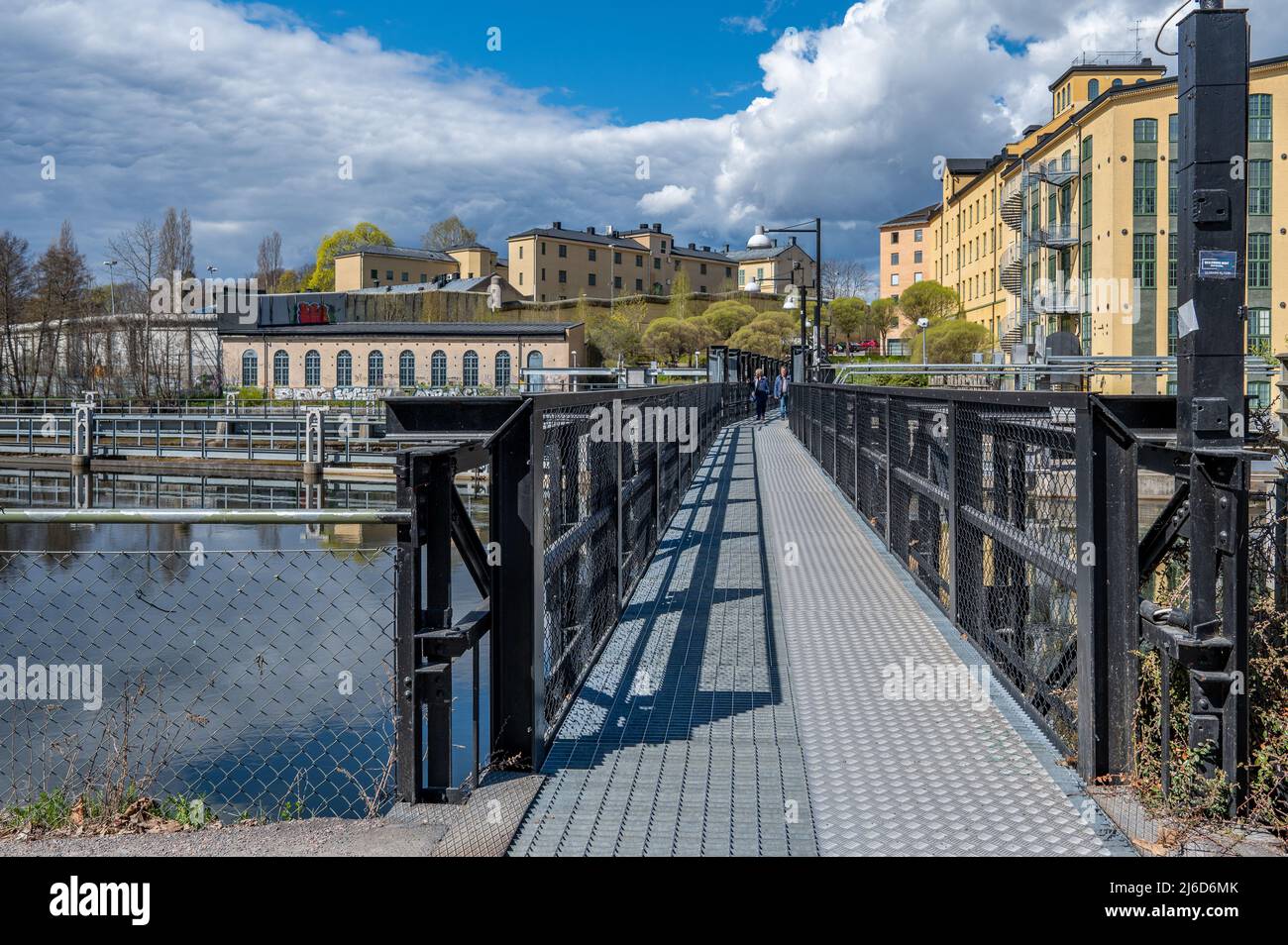 The historic industrial landscape and Motala river in Norrköping ...