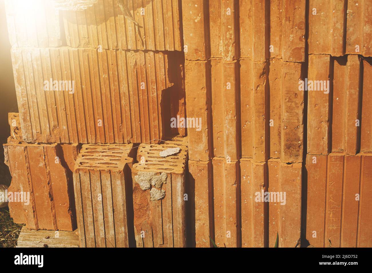 A stack of clay bricks.Material for construction Stock Photo - Alamy