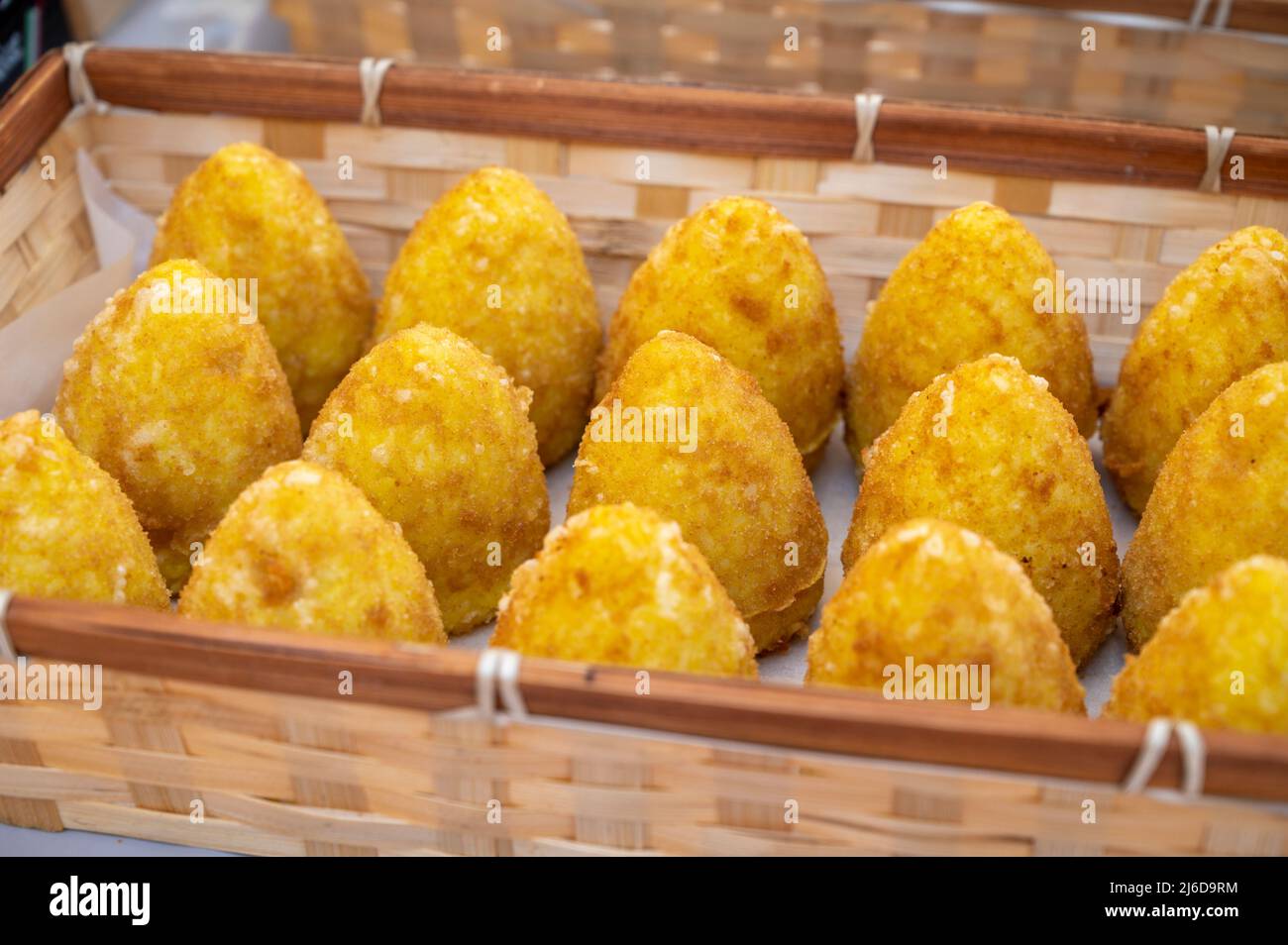 Sicilian street food, deep fried rice croquettes with different ...