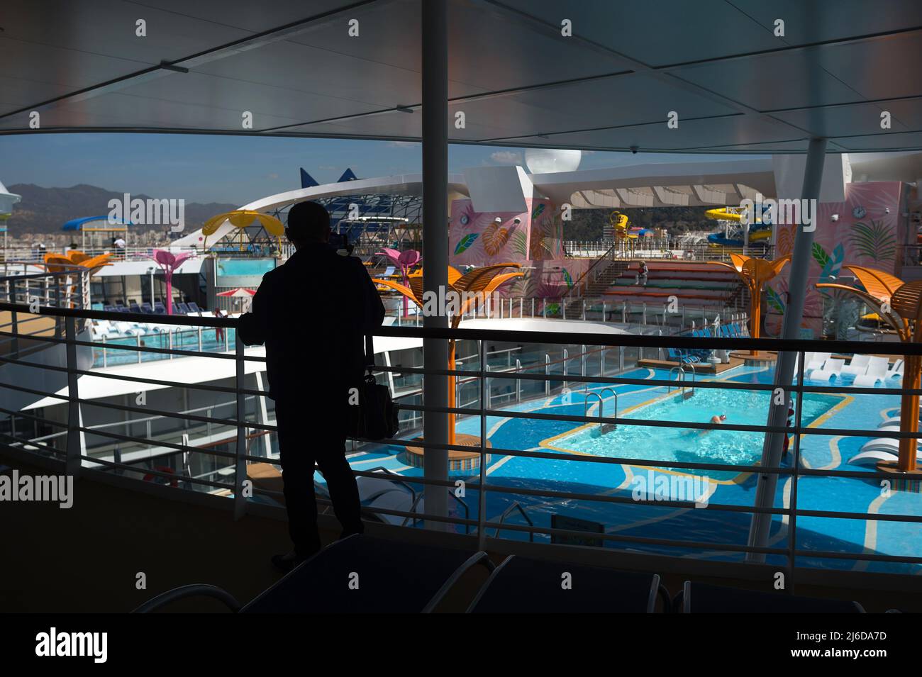 A general view shows attractions and a swimming pool inside cruise ship ...