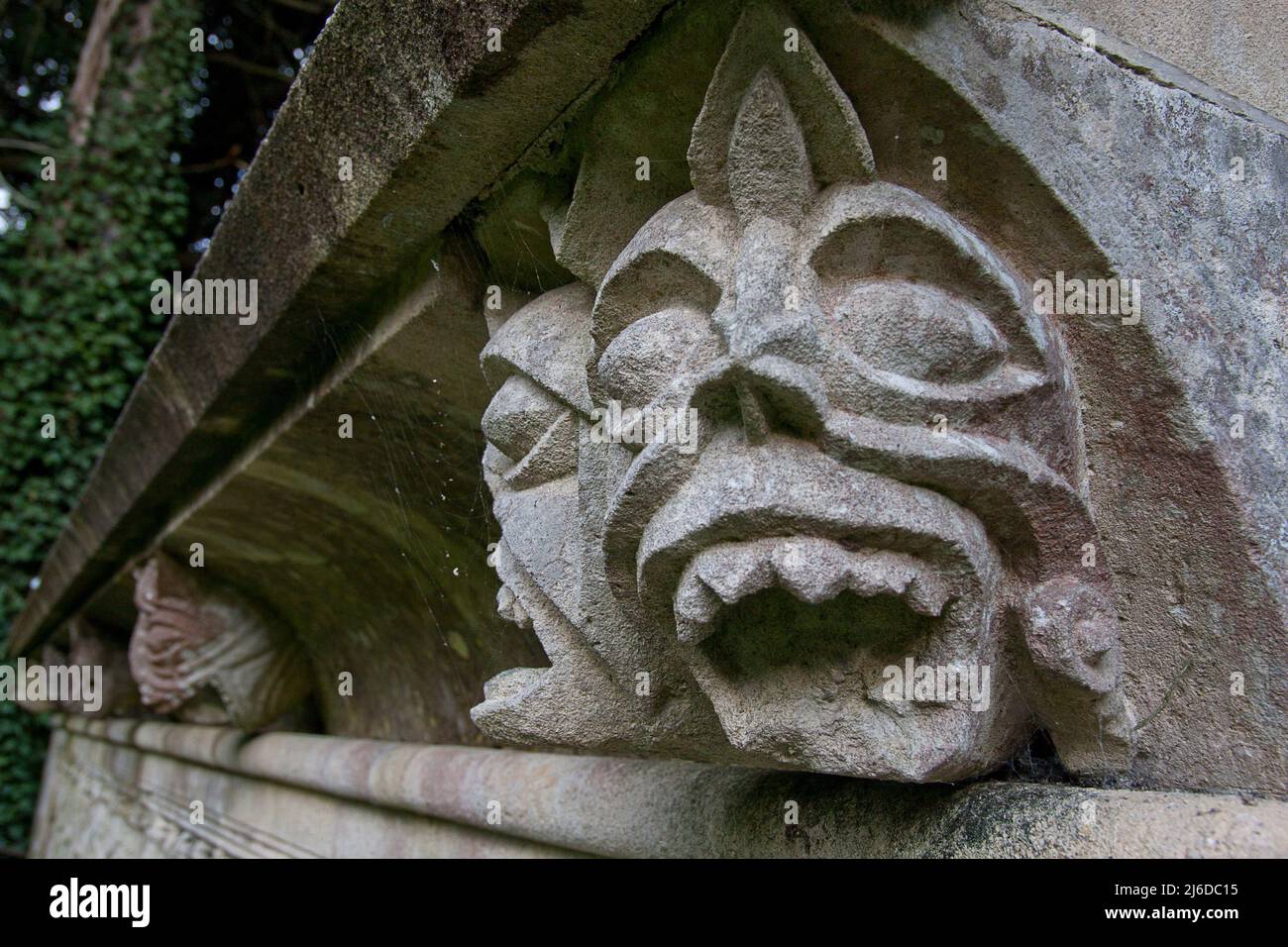 the mauseleum & grotesque medieval carvings in the grounds of St Peter ...