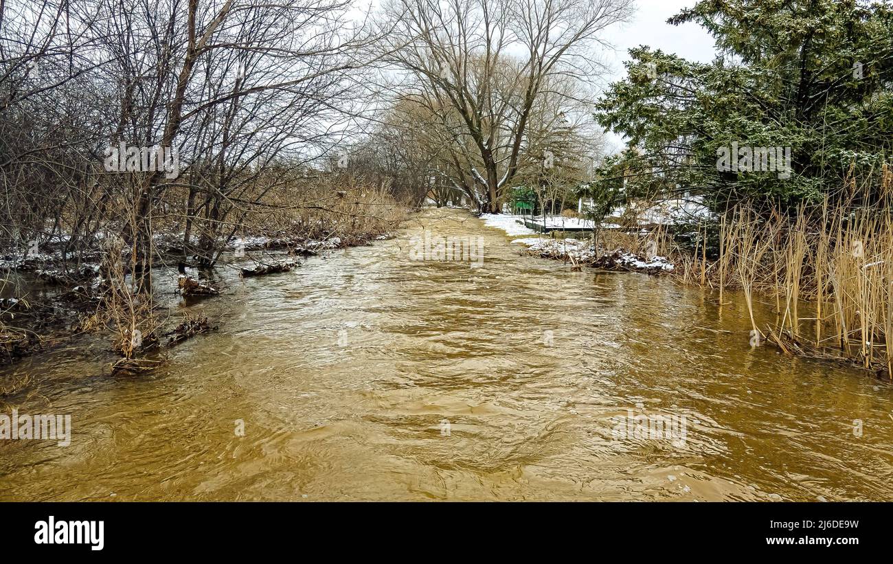 Springtime snow melt has arirved and the water is moving very fast down ...