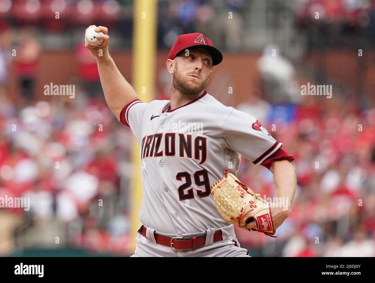 Arizona Diamondbacks starting pitcher Merrill Kelly delivers a pitch to ...