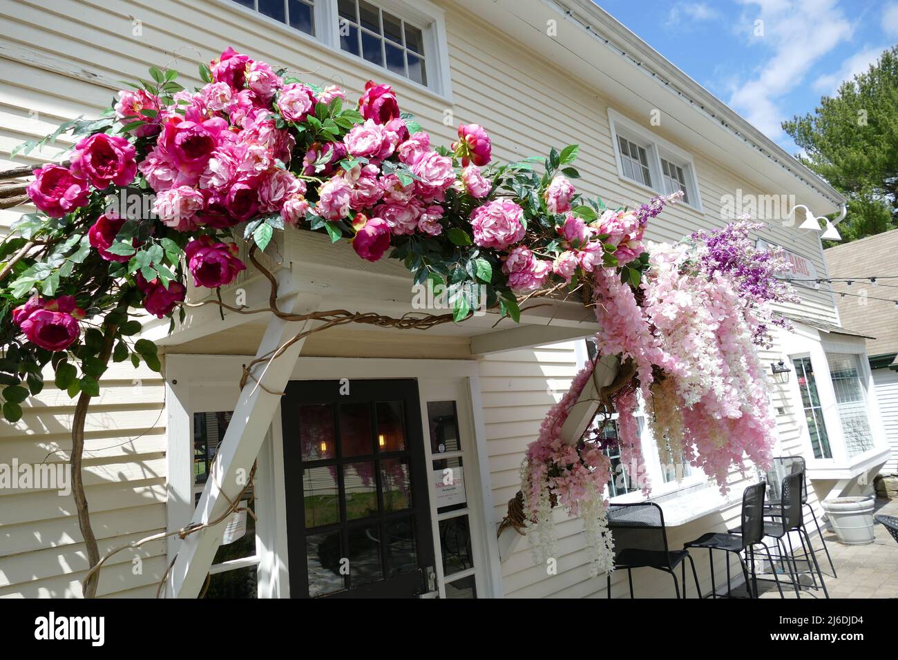 Spring Flowers Over Doorway Stock Photo - Alamy