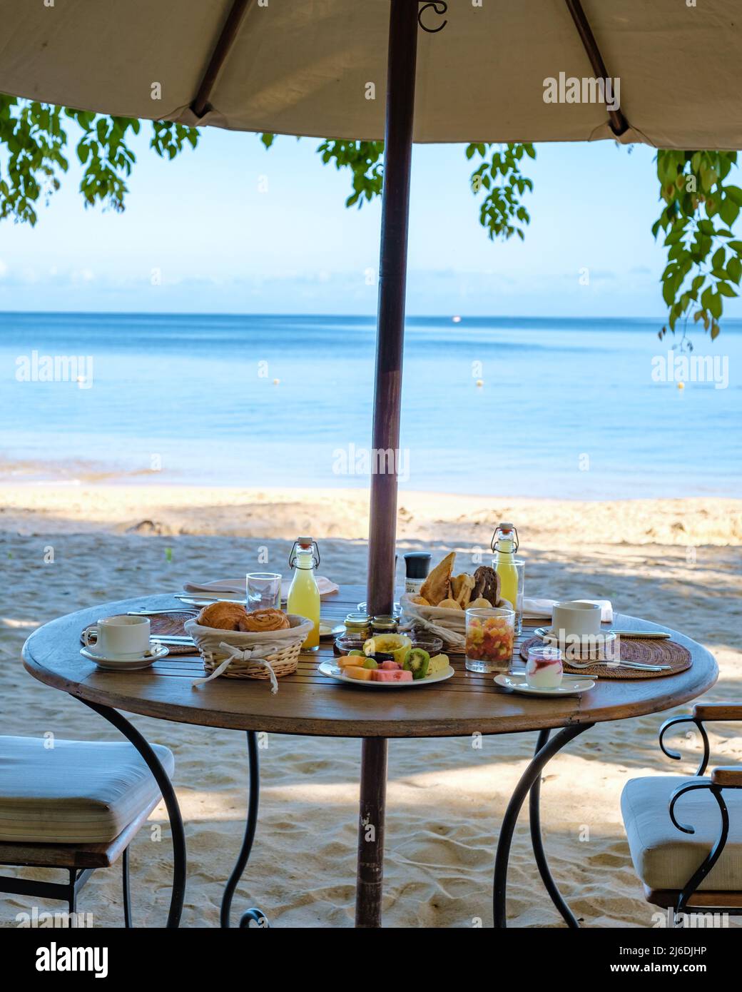 breakfast on the beach of a luxury resort during vacation. luxury ...