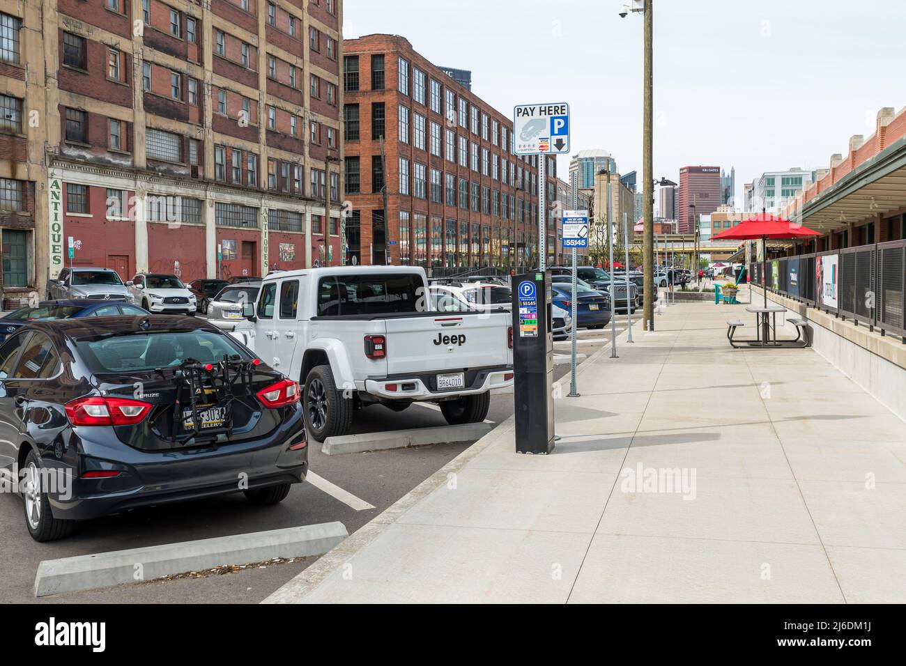 Cars parked along Smallman Street in the Strip District neighborhood ...