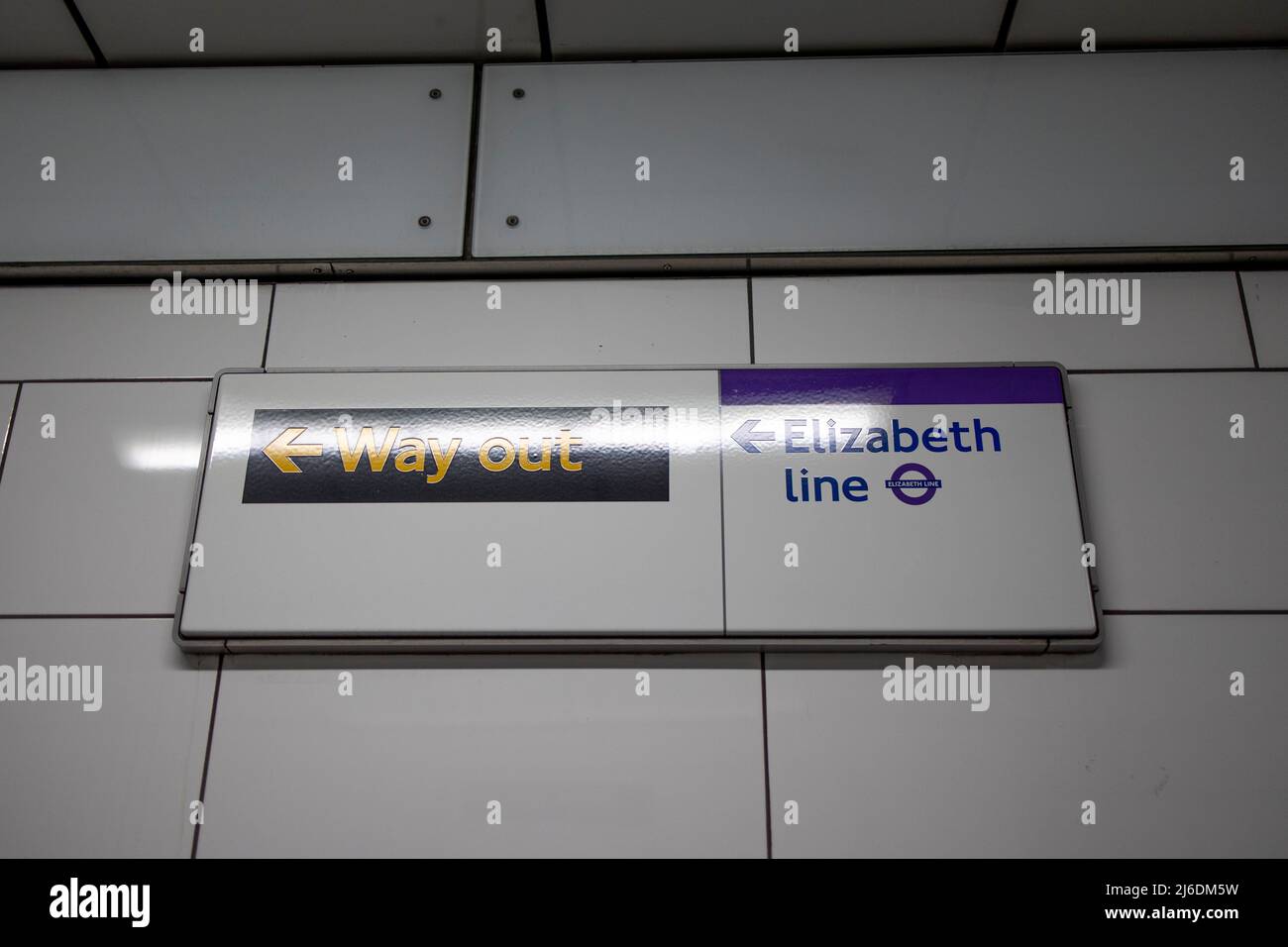 A new sign directing to the Elizabeth Line is seen inside the London ...
