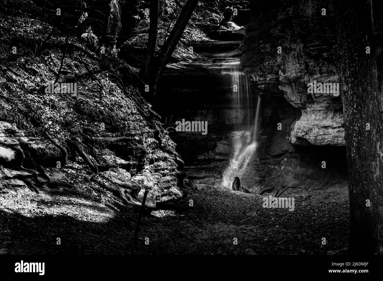 B&W long exposure photography of a waterfall in a slate canyon at ...