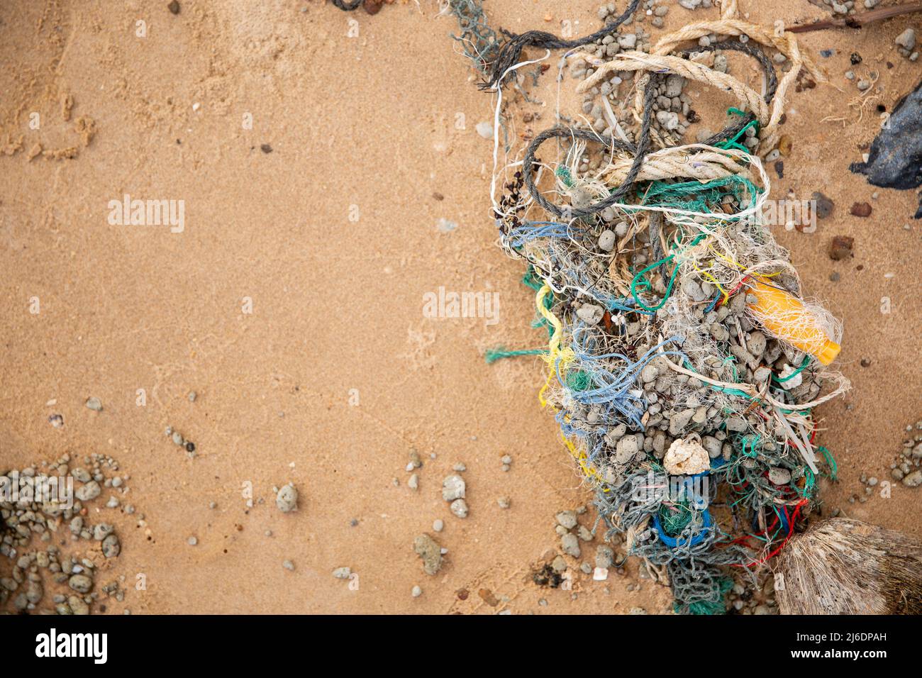 Garbage dumped on the beach, marine garbage Stock Photo - Alamy