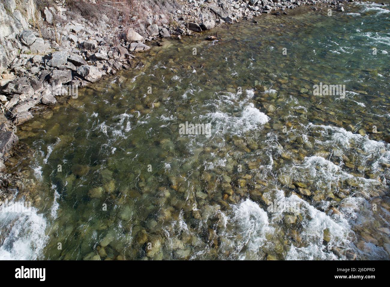 shallow river flowing through a canyon Stock Photo - Alamy