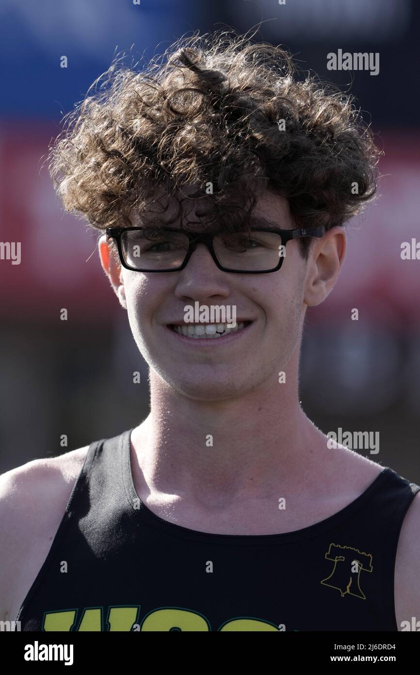 Gary Martin of Archbishop Wood poses after winning the high boys' mile ...