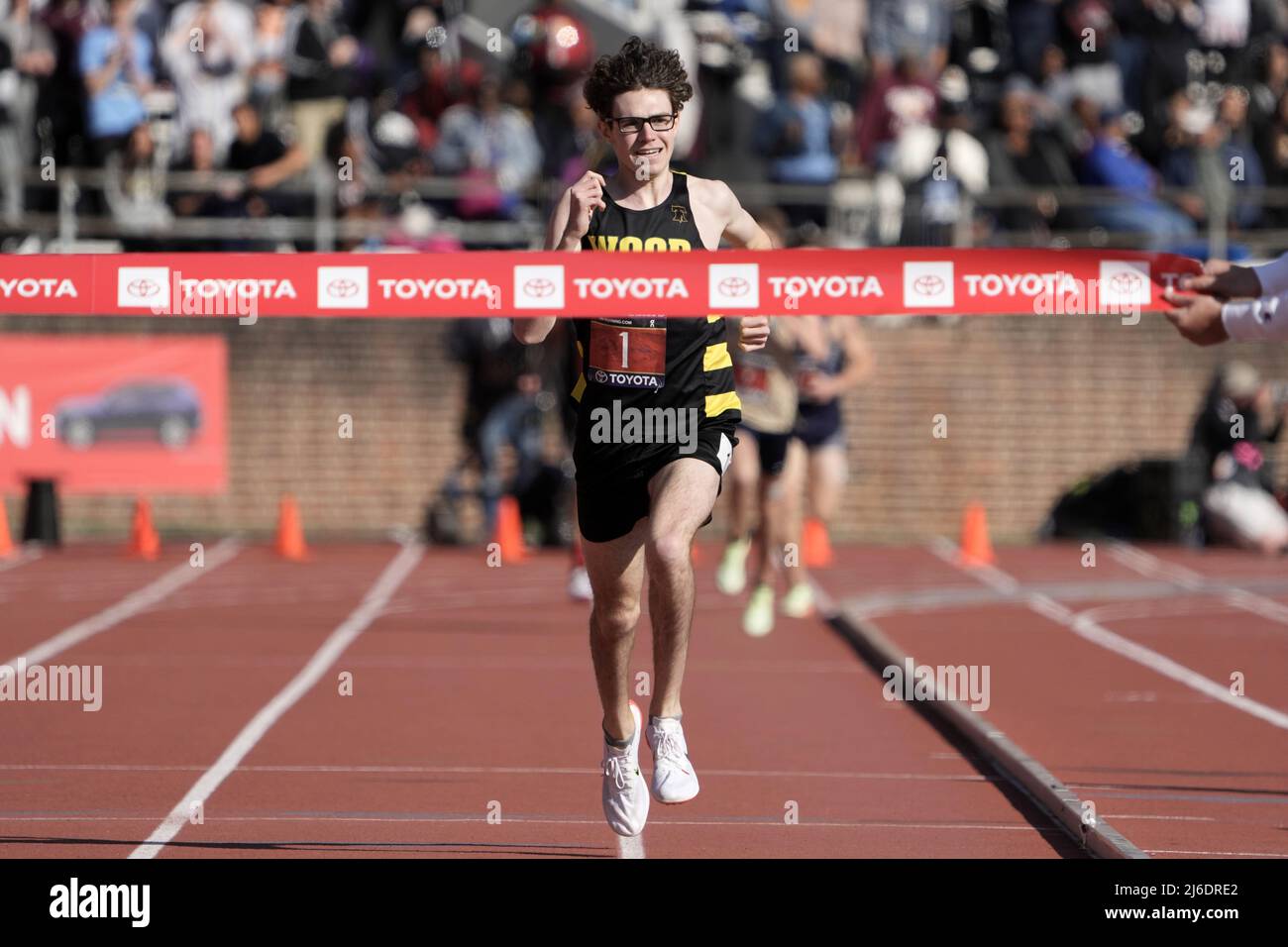 Gary Martin of Archbishop Wood celebrates after winning the high boys ...