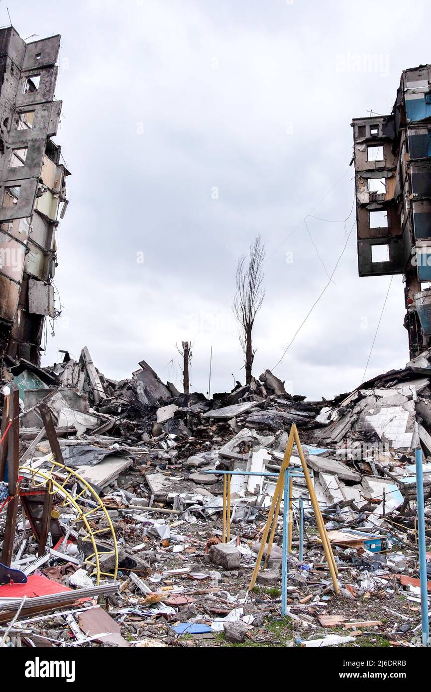A playground rests burnt and destroyed among debris of a heavily bombed ...