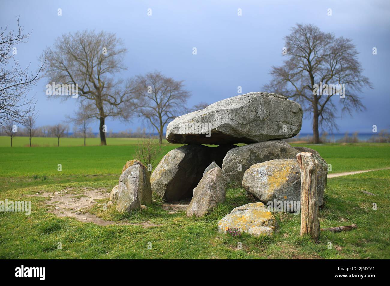 Dolmen of Mechelsdorf in northern Germany with storm clouds in ...