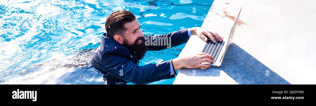 Businessman in suit with laptop on swimming pool. Funny businessman ...
