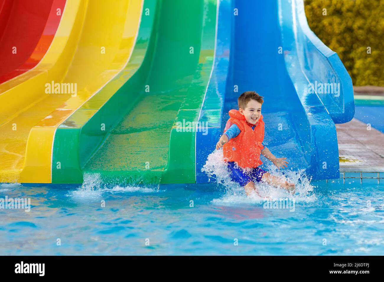 Boy water slide hi-res stock photography and images - Alamy