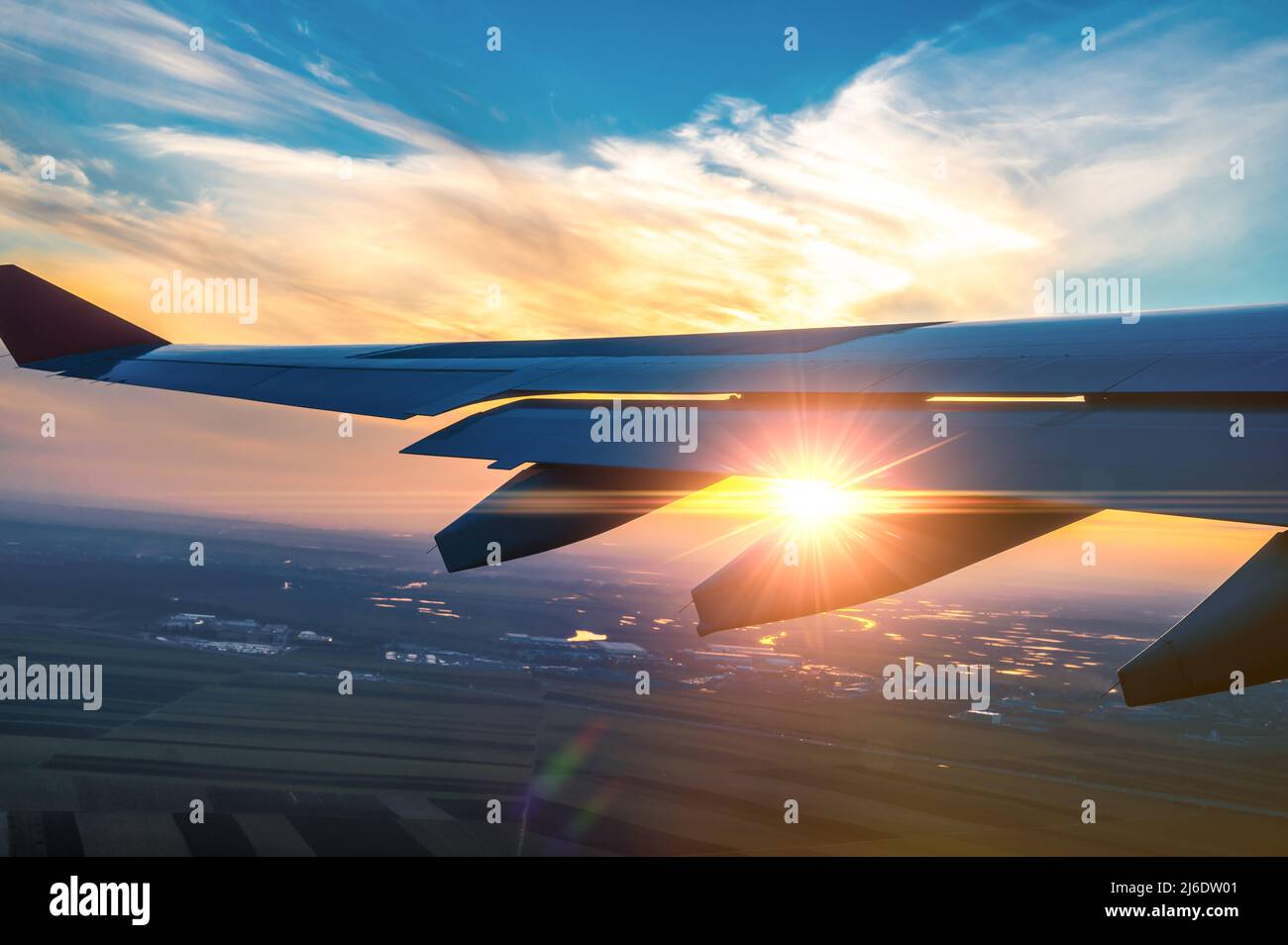 Pretty Sunset Sky With Plane