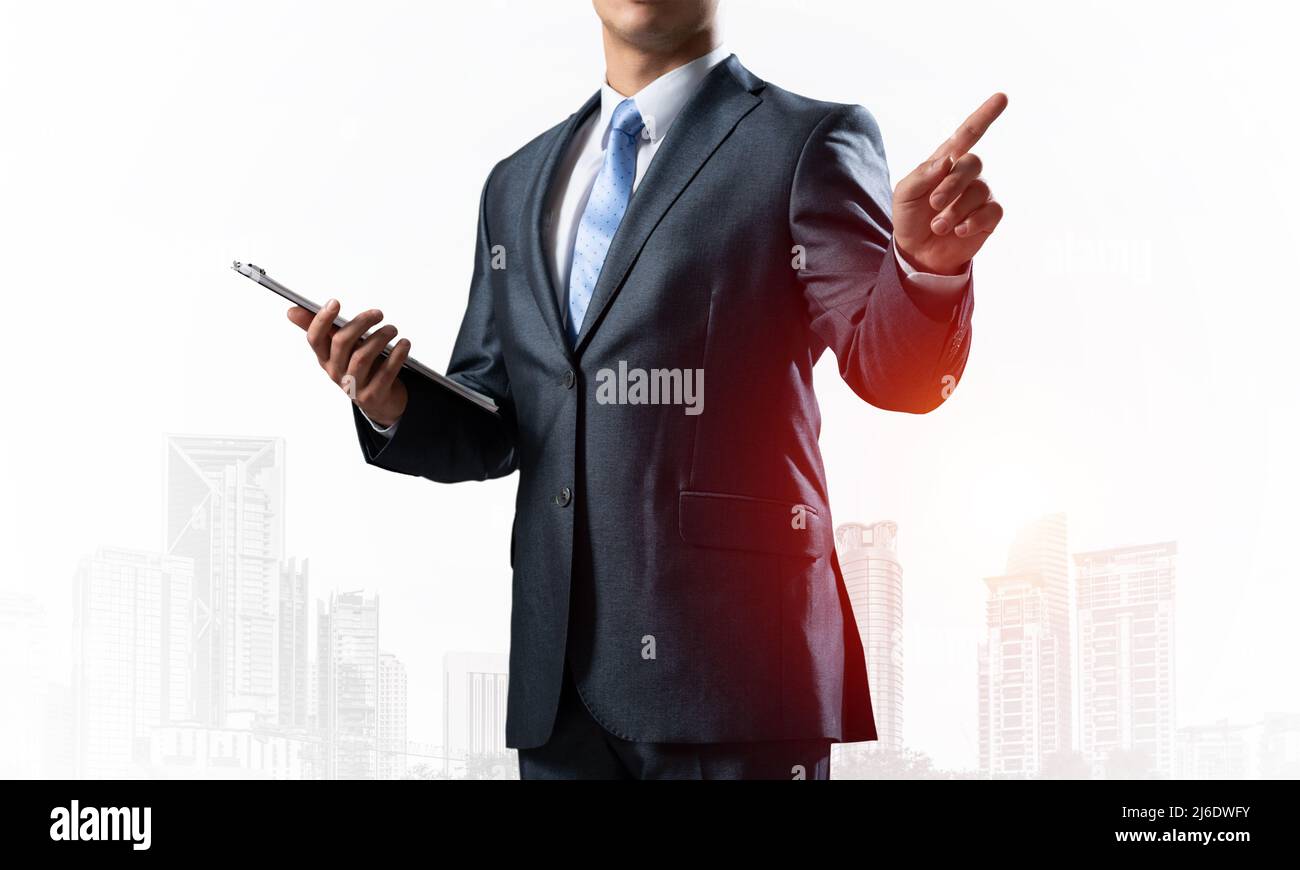 Front view of man in business suit and tie Stock Photo - Alamy