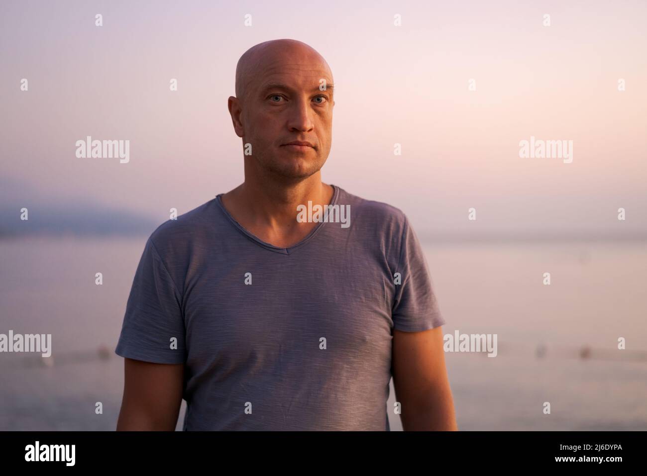 Bald guy on beach hi-res stock photography and images - Alamy