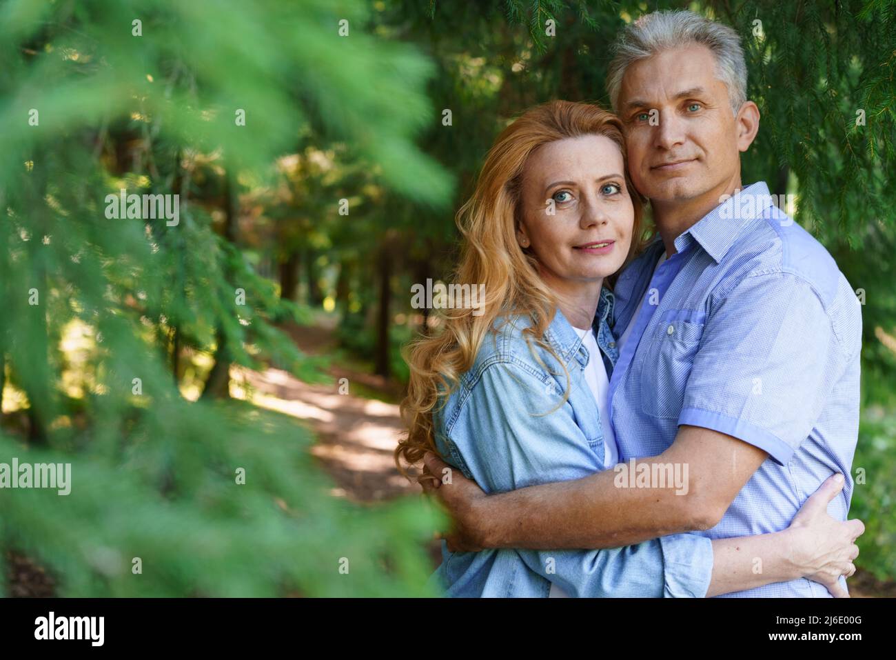Old age, relationships and people concept happy senior couple hugging ...