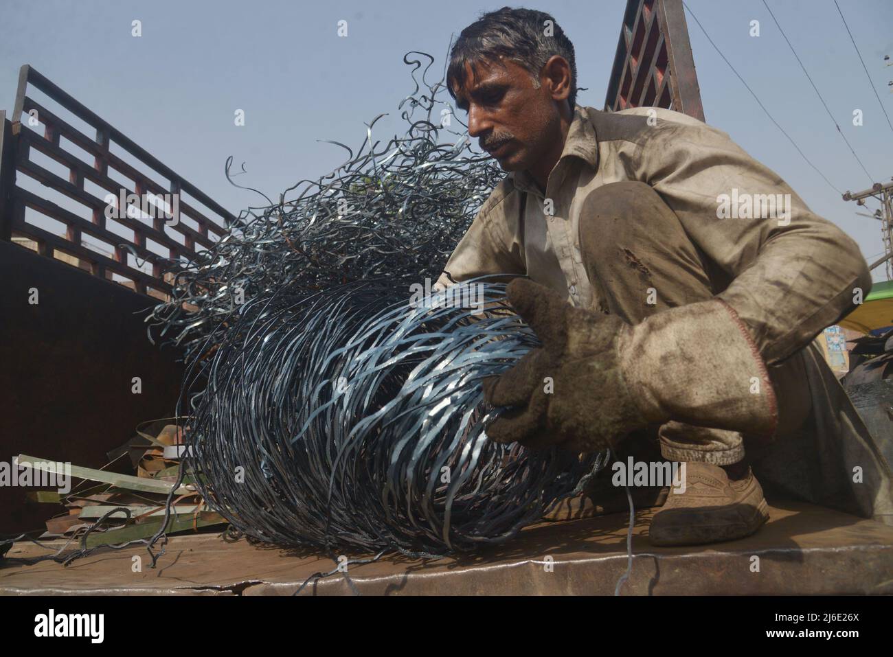 April 30, 2022, Lahore, Punjab, Pakistan: Pakistani laborers are busy ...