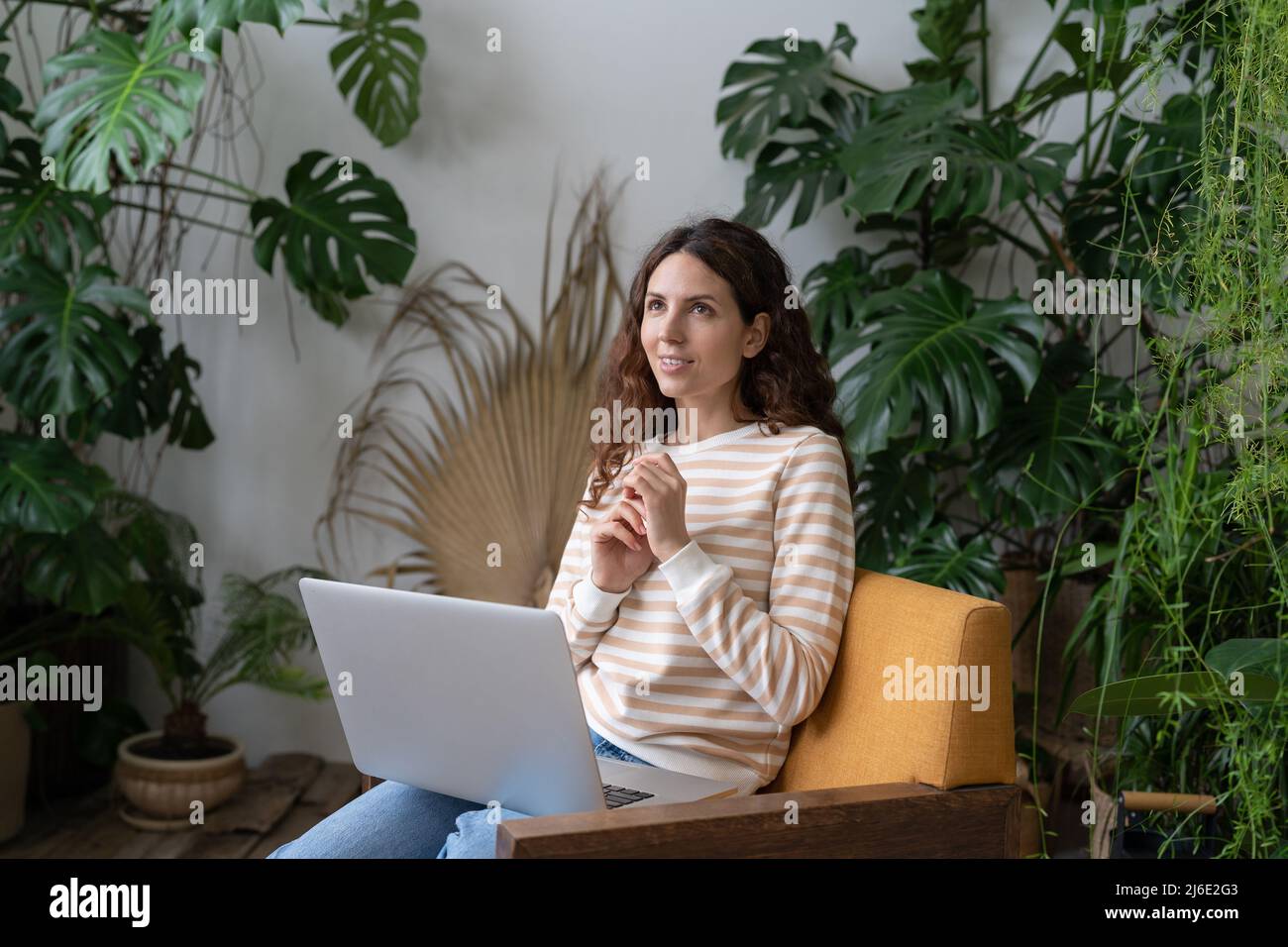 Flirting young woman communicate with boyfriend in online app on laptop ...