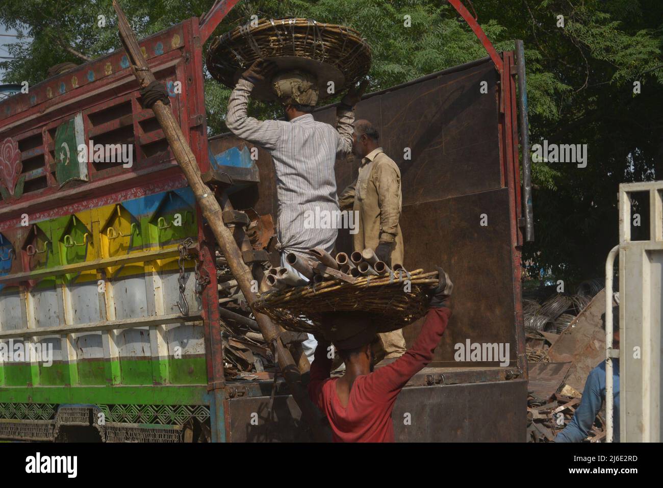 April 30, 2022, Lahore, Punjab, Pakistan: Pakistani laborers are busy ...