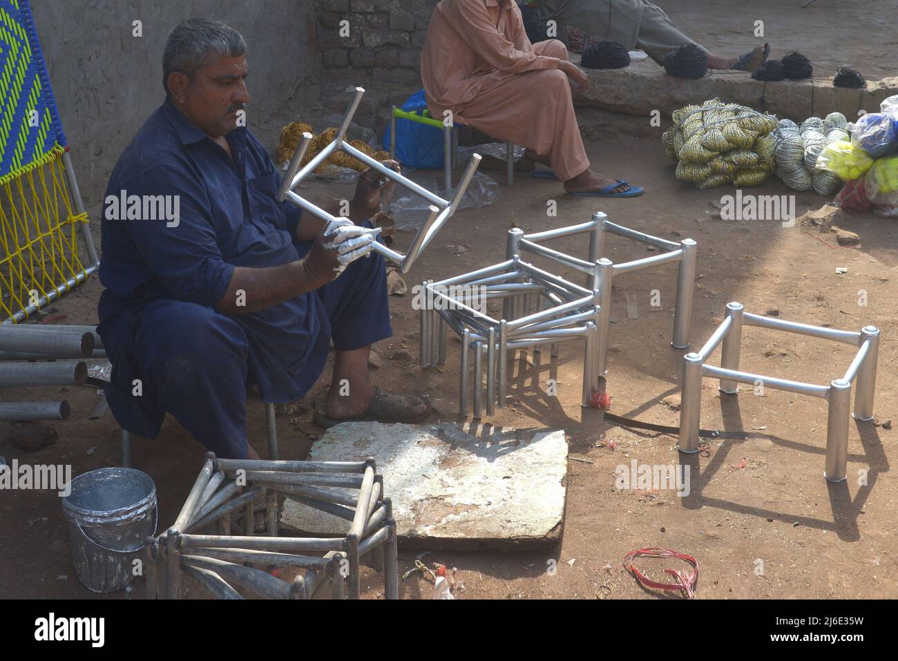 April 30, 2022, Lahore, Punjab, Pakistan: Pakistani laborers are busy ...