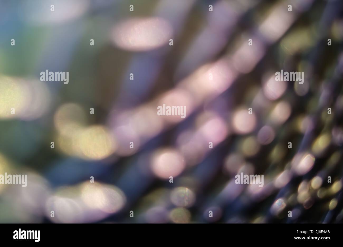 Blurred background from broken glass. Refraction of light and glare ...