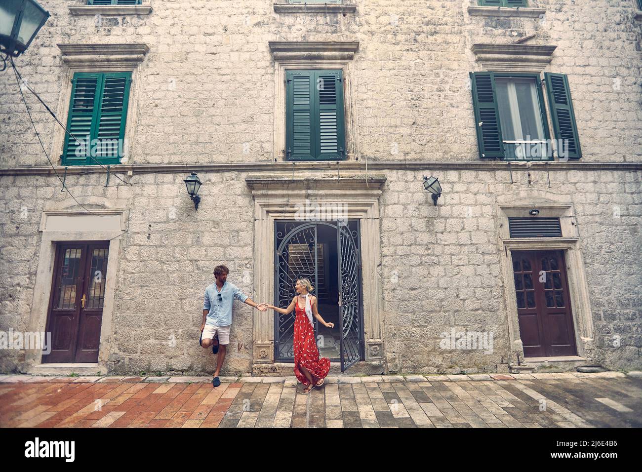 Smiling man and woman on travel vacation holidays. People having fun ...