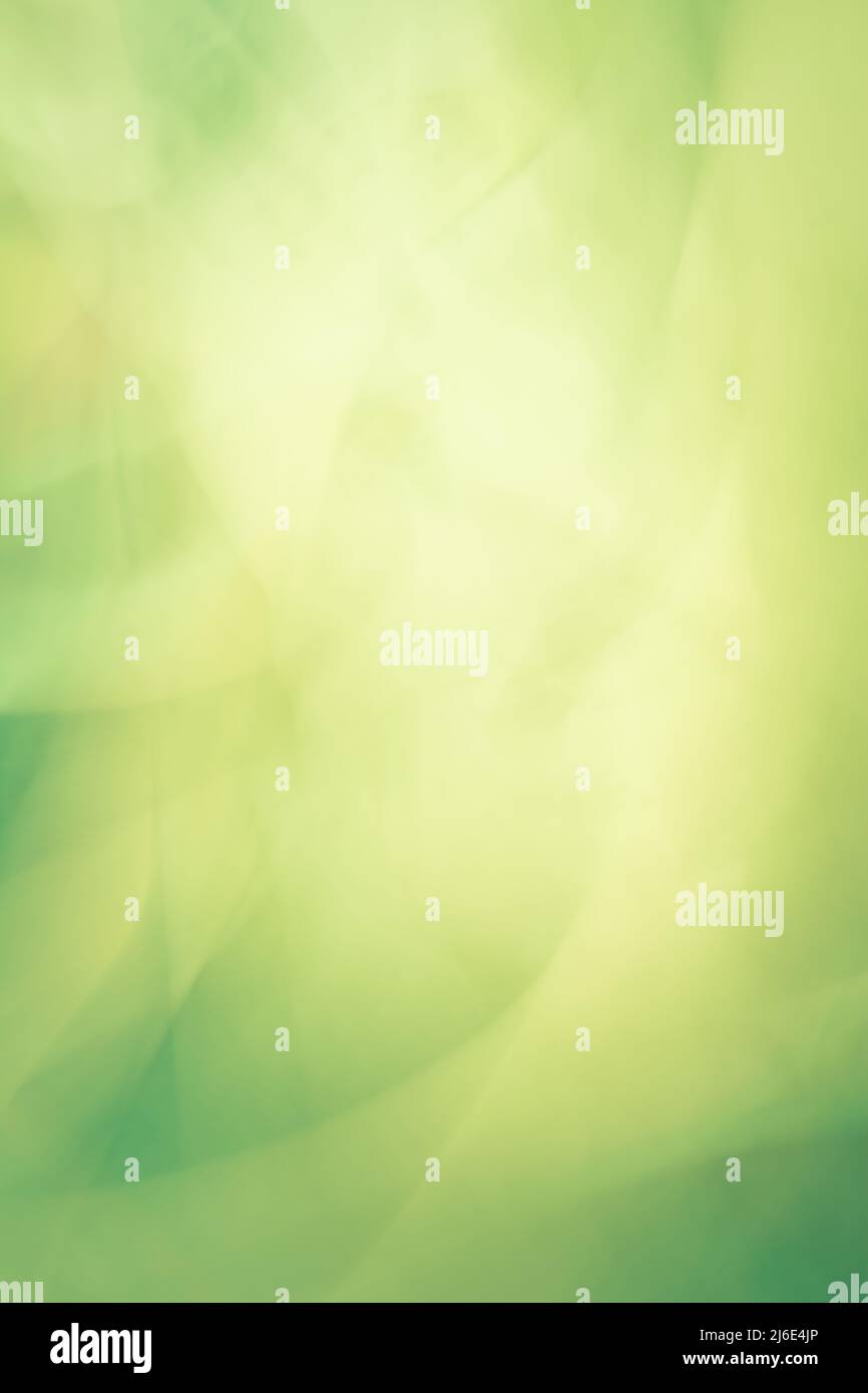 Vertical soft green background with yellow tints. Abstract spring ...