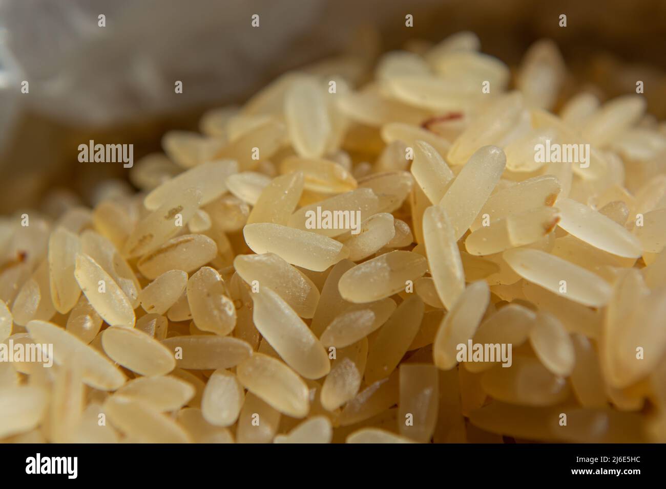 Dry rice in a bag close-up. Culinary theme. Selective focus Stock Photo ...