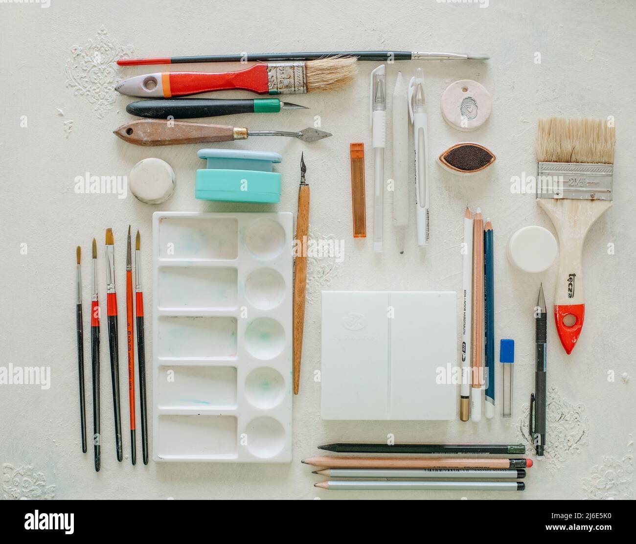 a set of repair and processing tools laid out on a table Stock Photo ...