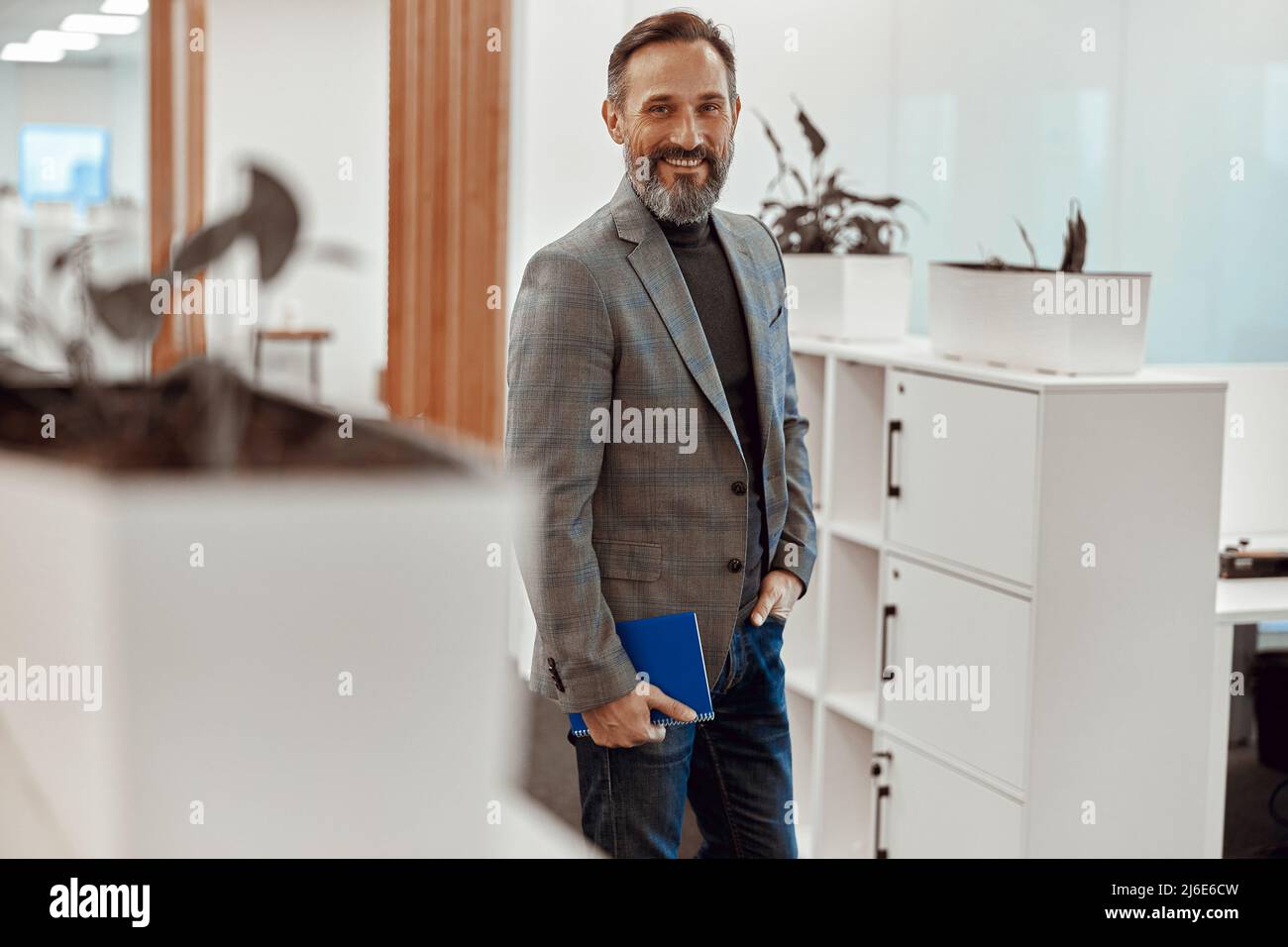 Man working standing coworking space hi-res stock photography and ...