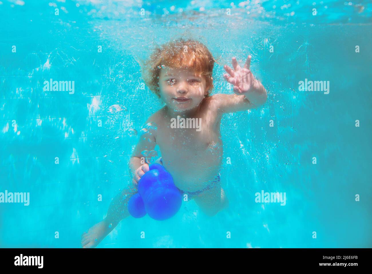 Baby swimming underwater hi-res stock photography and images - Alamy