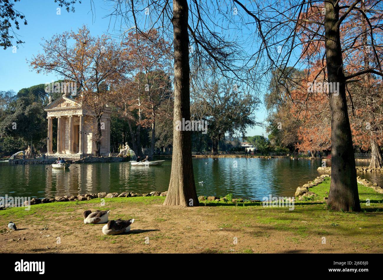 Small lake in Villa Borghese Park with the neoclassical Temple of Aesculapius (built by ...