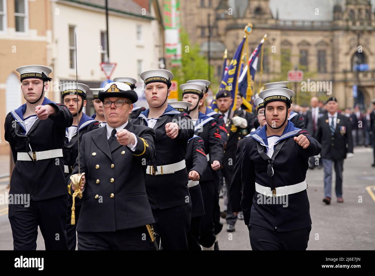 People take part in a parade towards the Sheffield War Memorial, also ...