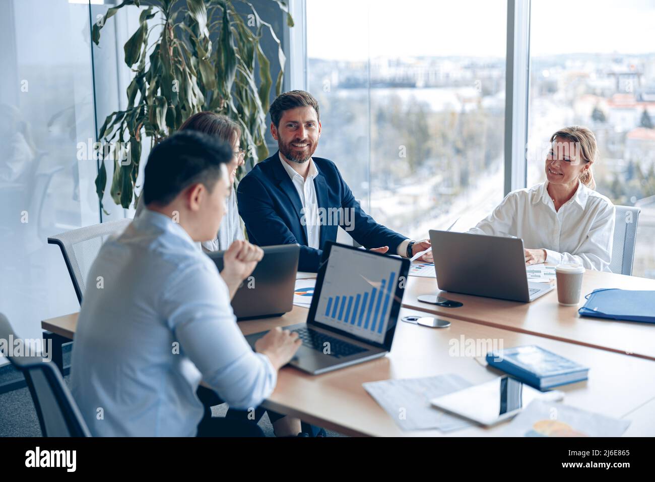 Creative business team working on project in modern office with ...