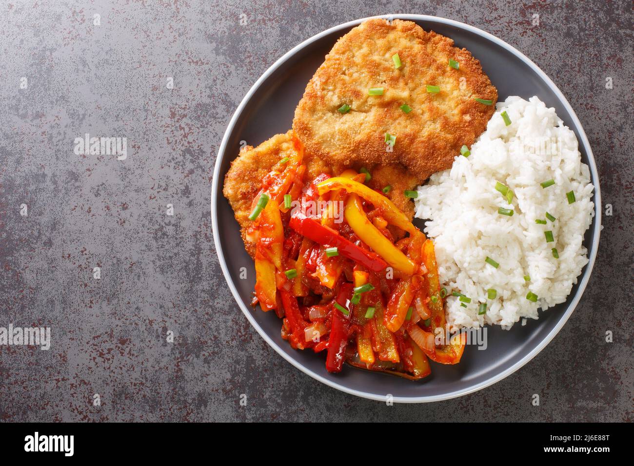 Paprika schnitzel served with a spicy Gypsy sauce of bell peppers and ...