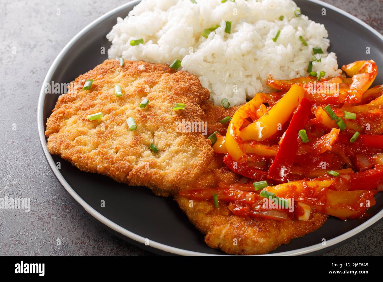 Paprika schnitzel served with a spicy Gypsy sauce of bell peppers and ...