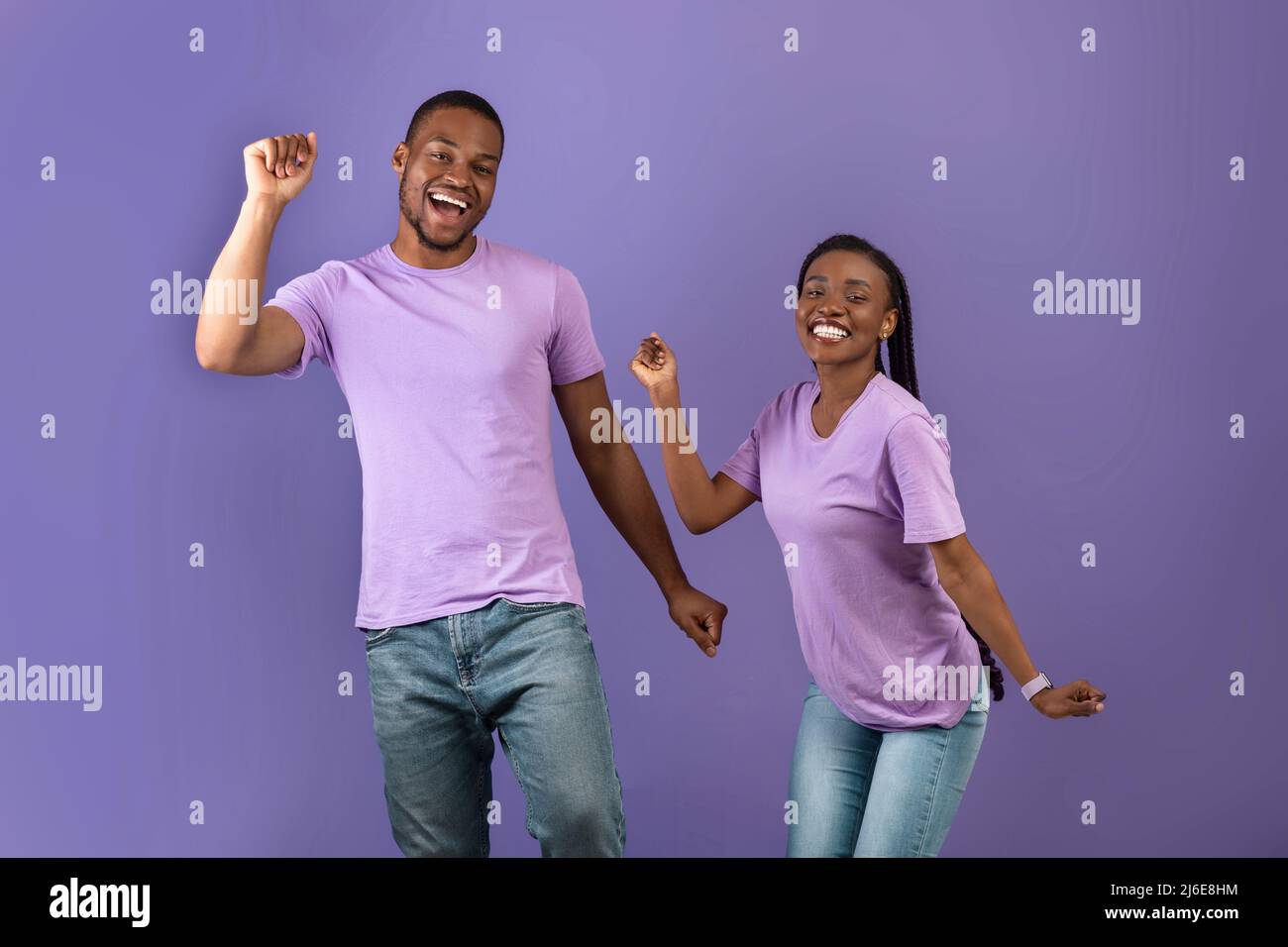 Portrait of emotional black couple dancing at studio Stock Photo - Alamy