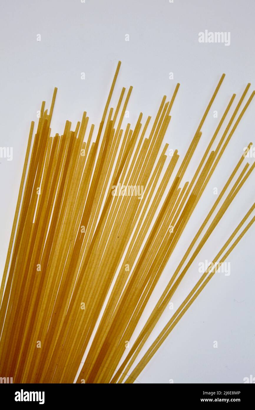 Dry pasta spaghetti and fusilli on white background May 2022 Stock ...