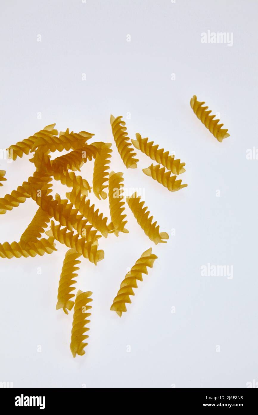 Dry pasta spaghetti and fusilli on white background May 2022 Stock ...