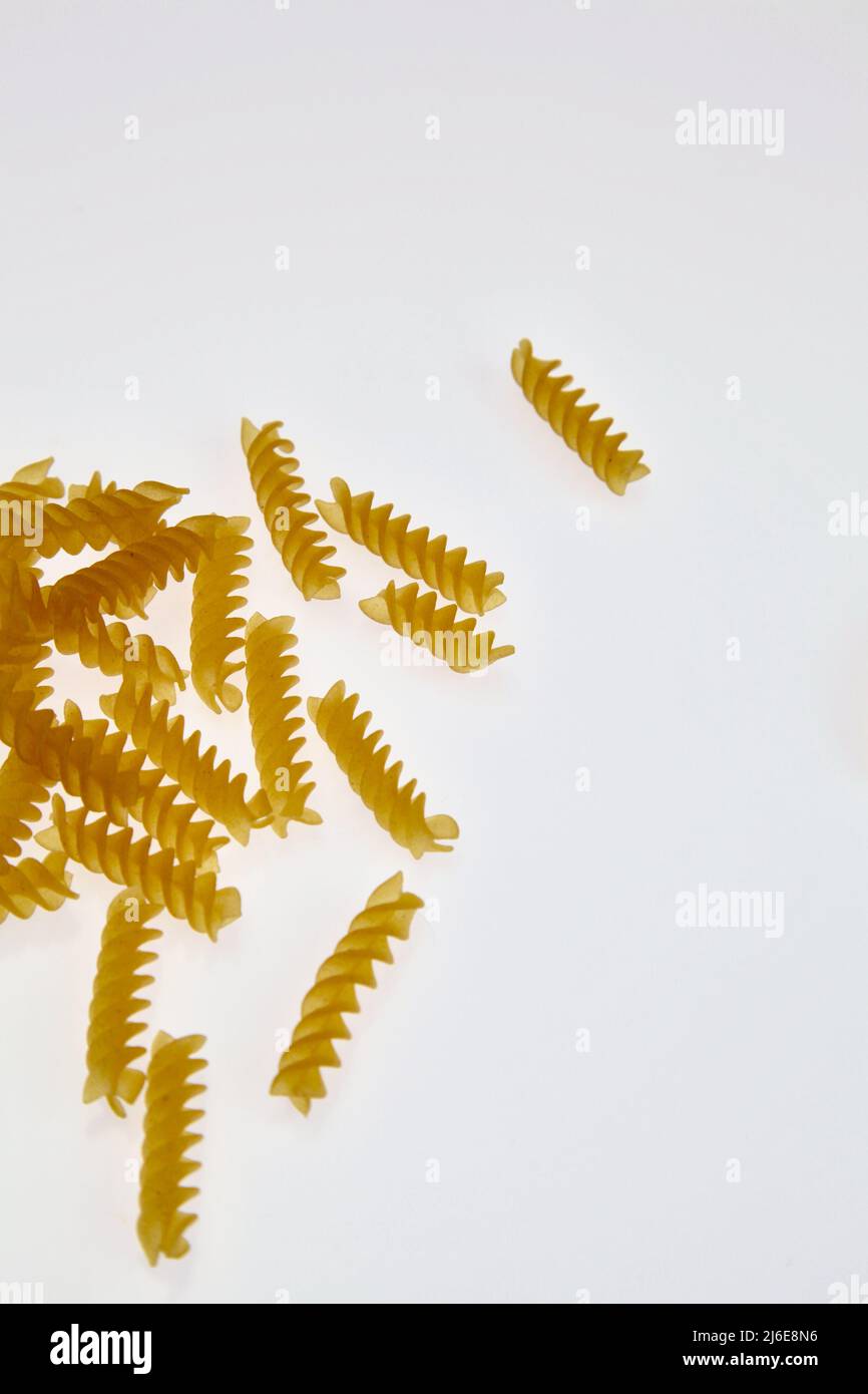 Dry pasta spaghetti and fusilli on white background May 2022 Stock ...