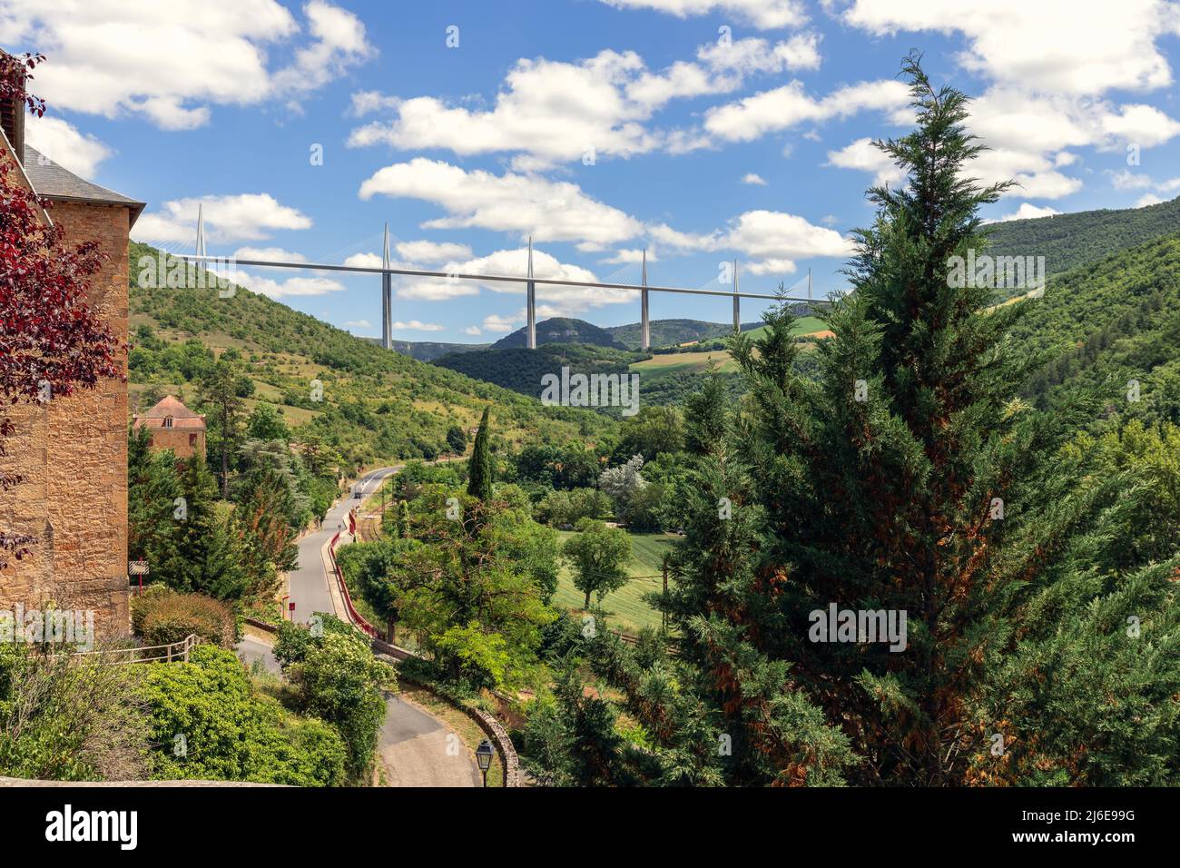 Old valley road D41 enters Peyre village and Millau Viaduct on ...