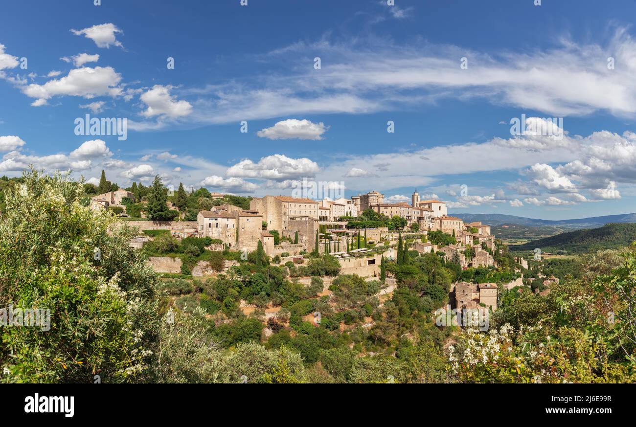 Panoramic view of Gordes forest rock and old village on Luberon massif ...